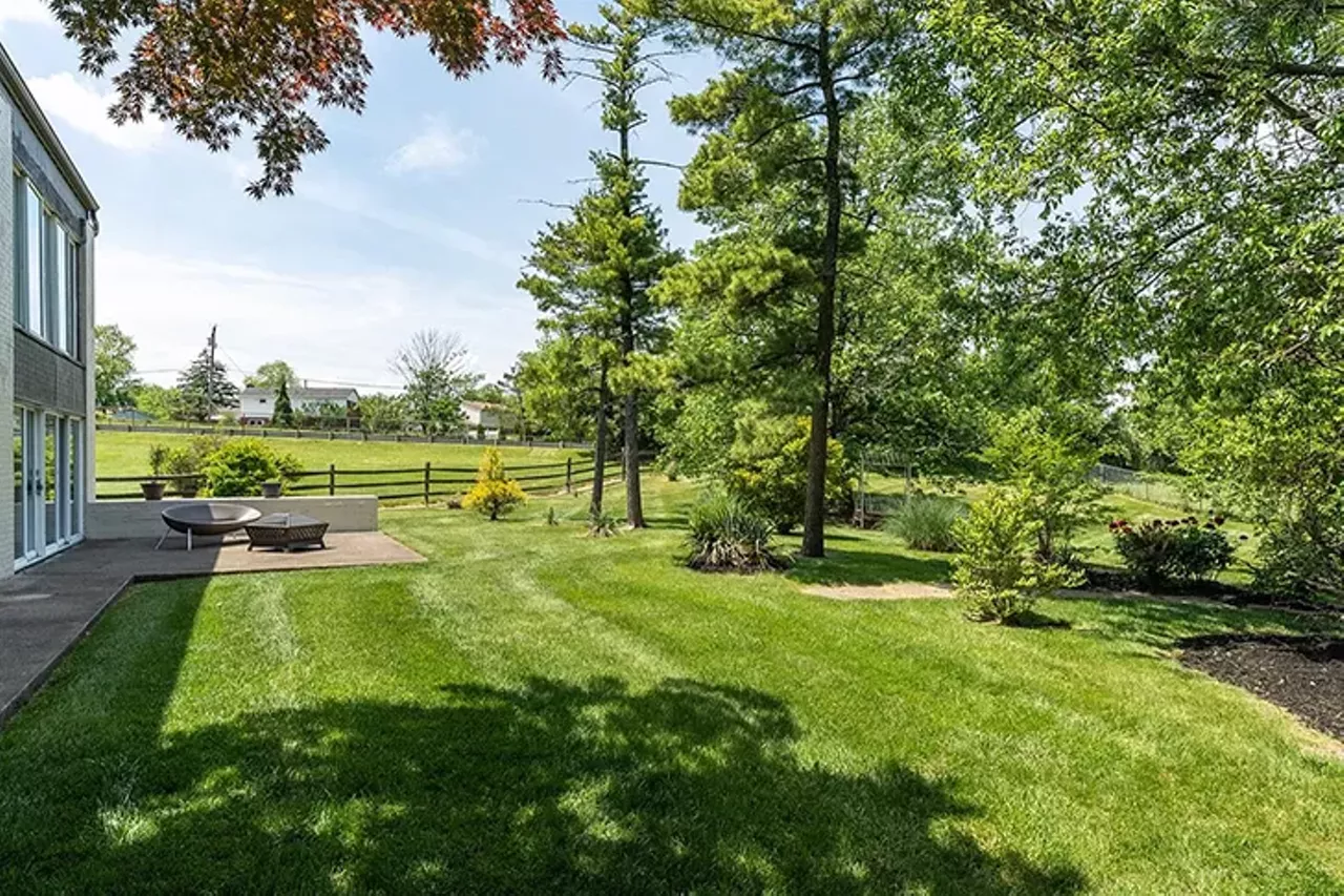 This Midcentury Modern Forest Park Home Has a Groovy Basement Tiki Bar