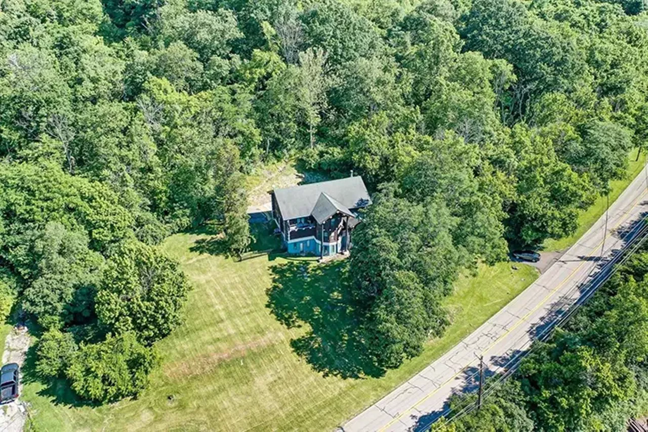 This West Side Log Cabin Boasts Scenic Views of the Ohio River